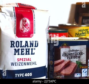 Shopping cart with long-life German groceries Stock Photo - Alamy