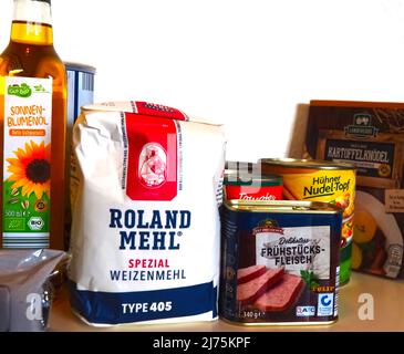 Shopping cart with long-life German groceries Stock Photo - Alamy