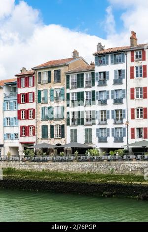 Bayonne in the pays Basque, colorful shutters on a typical facade in ...