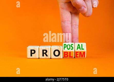 Solving a problem and making proposal symbol. Businessman turns wooden ...
