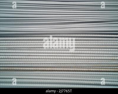 Rusty steel ribbed construction rods. Rebar background Stock Photo - Alamy
