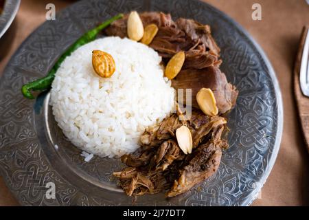 Assyrian dish with lamb and rice, in Mardin, Turkey. Authentic Assyrian ...
