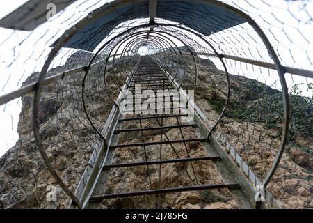 Iron ladder on Katskhi Pillar with ancient church on top in Chiatura ...