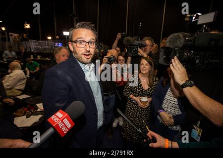 Alliance Party of NI’s Nick Mathison (centre left) with party colleague ...