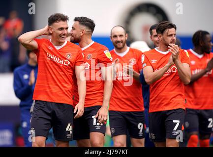 Kal Naismith (3) of Luton Town (right) celebrates after he scores his ...