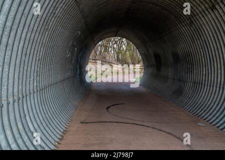 bike trail and corrugated metal underpass Stock Photo - Alamy