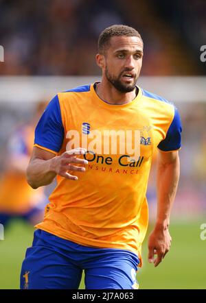 . Mansfield Town's Jordan Bowery in action with Barrow's James Jones ...
