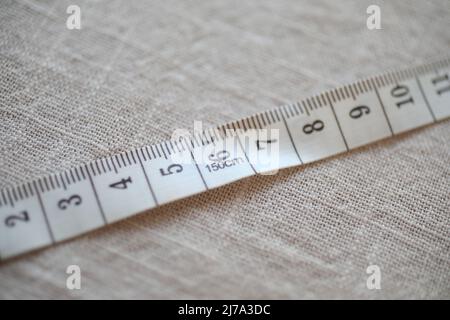 60 Inch, 150 cm, tape measure/measuring tape in a home Stock Photo - Alamy