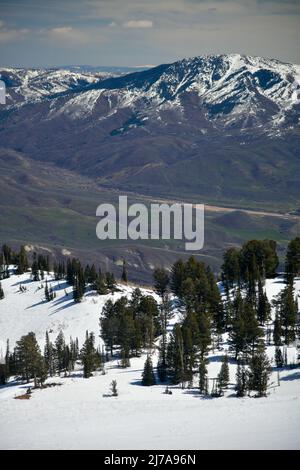 Beautiful landscape at Snowbasin Ski Resort, Utah. Snow slopes, rocky ...