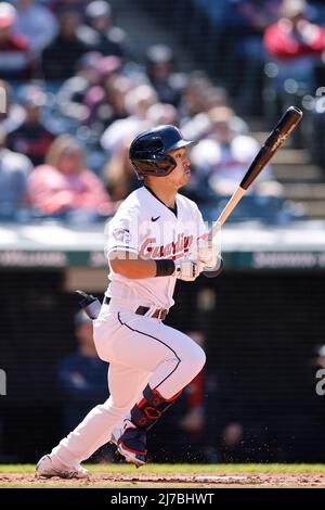 Cleveland Guardians' Steven Kwan, right, celebrates after his double ...