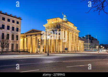 The backside of the famous Brandenburg Gate in Berlin seen through some ...