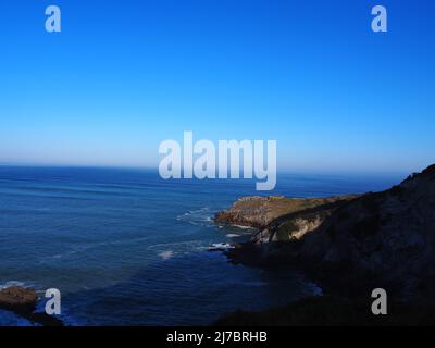 Route to the Gorliz Lighthouse, from the beach and between cliffs ...
