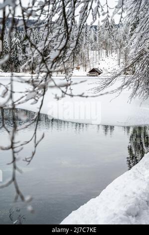 Winter on Lake Fusine. After a heavy snowfall Stock Photo - Alamy