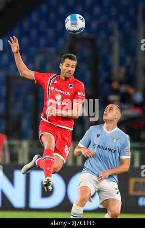 Adam Marusic of S.S. Lazio and Antonio Sanabria of U.S. Cremonese are ...