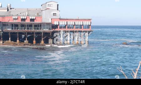 Waterfront beachfront cafe on piles, pillars or pylons, Monterey beach ...