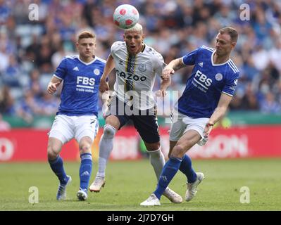 Jonny Evans of Leicester City challenges Troy Deeney of Watford during ...