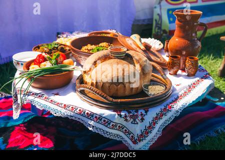 Traditional dishes of Gagauz cuisine at the Hederlez festival in in ...