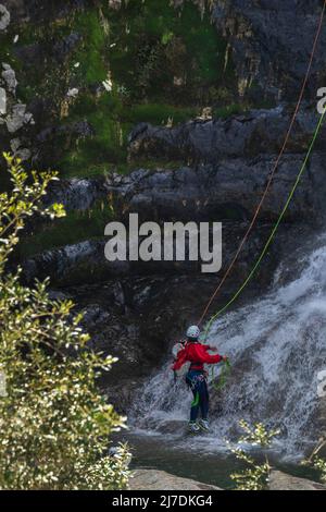 Waterfall Rappelling On Canyoning Adventure Stock Photo - Alamy