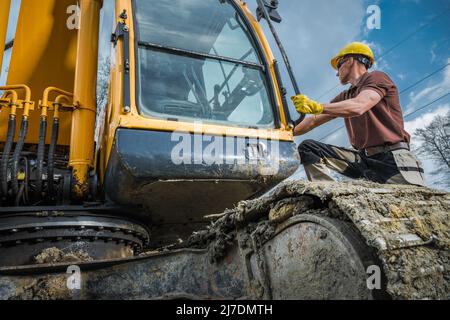 Professional Construction Crawler Equipment Operator in His 30s Taking ...