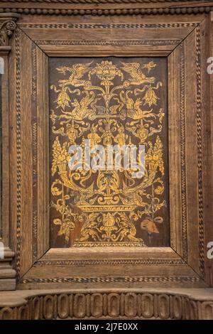 These choir stall panels are detailed wooden carvings, often used in ...