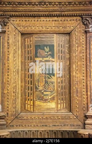 These choir stall panels are detailed wooden carvings, often used in ...