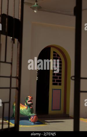 Sculpture of a guardian figure at Pulo Kemaro (Kemaro island) temple ...