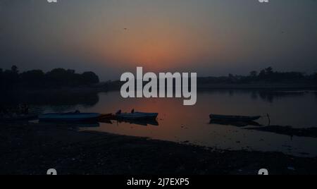 Pakistani people enjoying boating in Ravi River during sunset in Lahore ...