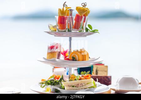 A table set for traditional English cream tea. Jam and scones naturally ...
