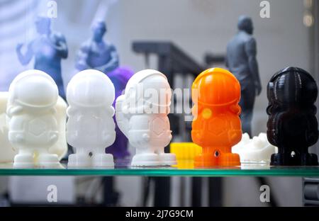 Multicolored 3D printed models. Objects printed on 3D printer from ...