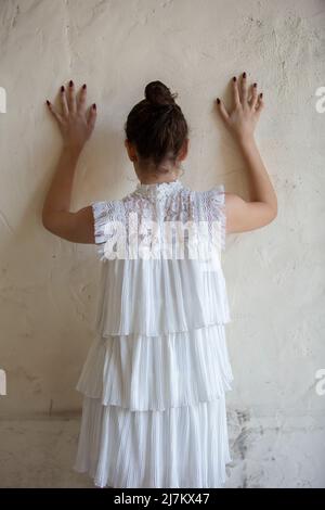 One person standing alone against beautiful color circle LED light ...