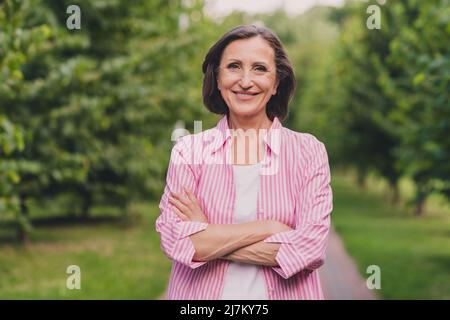 Photo of shiny pretty lady wear striped pullover smiling enjoying ...