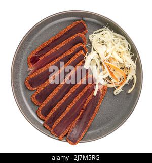Isolated plate of dried beef tenderloin basturma Stock Photo - Alamy
