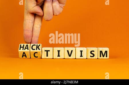 Activism or hacktivism symbol. Businessman turns wooden cubes and ...