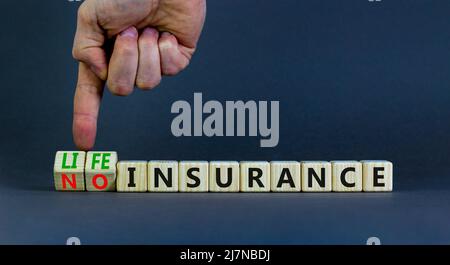 Life insurance symbol. Businessman turns cubes and changes concept ...