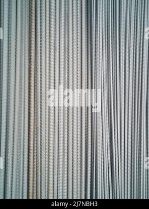 Rusty steel ribbed construction rods. Rebar background Stock Photo - Alamy