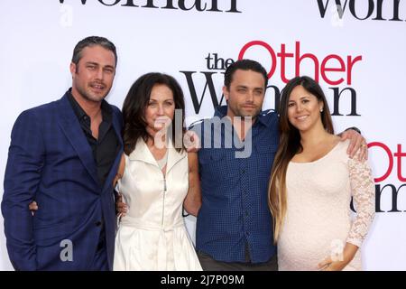 Taylor Kinney with his mother at the Los Angeles premiere of "The Other ...