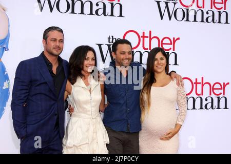 Taylor Kinney with his mother at the Los Angeles premiere of "The Other ...