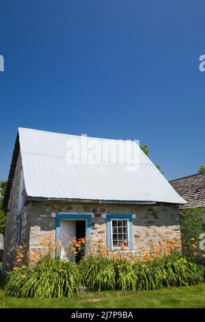 Old small circa 1775 fieldstone home with blue and white trim, grey ...