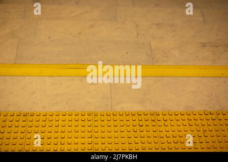 Tactile tiles for visually impaired. Infrastructure details. Steps with ...