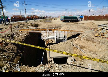Drainage system under the highway. Concrete pipe under the road. River ...