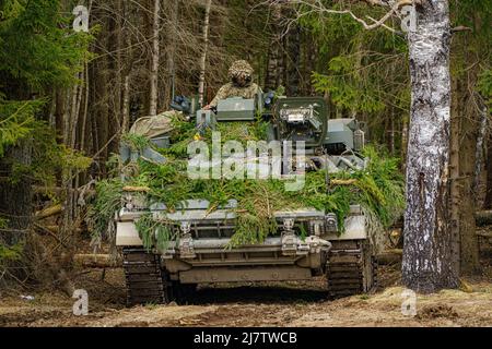 Modern British military vehicle with soldiers helmet on bonnet Stock ...