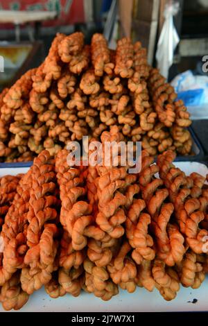 Mahua Chinese biscuits sold at a large colorful fresh produce market in ...