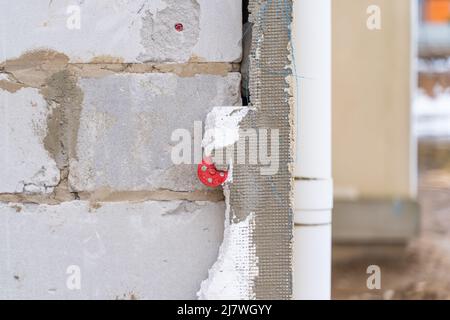 Polystyrene foam glued to an aerated concrete block wall Stock Photo ...