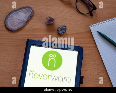 In this photo illustration, the Alphabet Inc. logo seen displayed on a ...