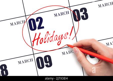 2nd day of March. A hand drawing outline of airplane on calendar date 2 ...