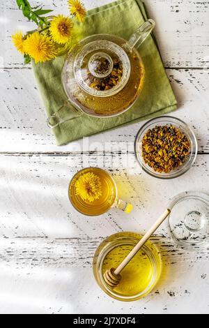 Flat lay of white cup with tea on dark background. Minimalism concept ...