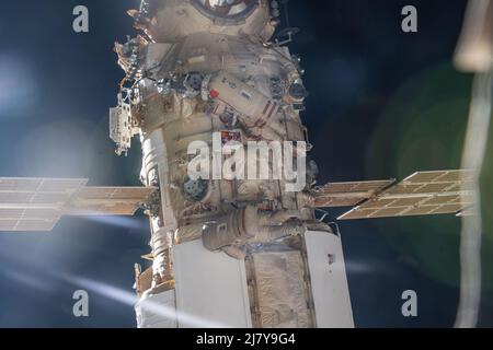 Roscosmos cosmonauts Oleg Artemyev and Denis Matveev are pictured attached to the Nauka ...