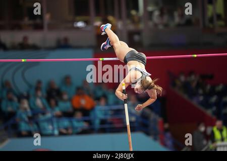 Olivia Mctaggart jumping at the 2022 Belgrade Indoor World ...