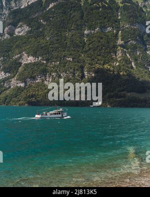 Murg Switzerland. 9. July 2018 Village of Murg facing Lake Walensee ...