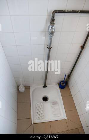 A squat or squatting toilet in France, sometimes known as Turkish ...